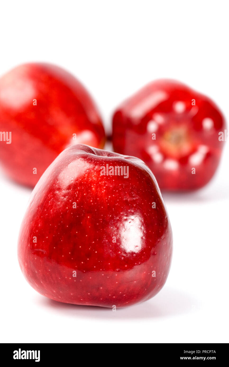 three red apples isolated on white background Stock Photo - Alamy