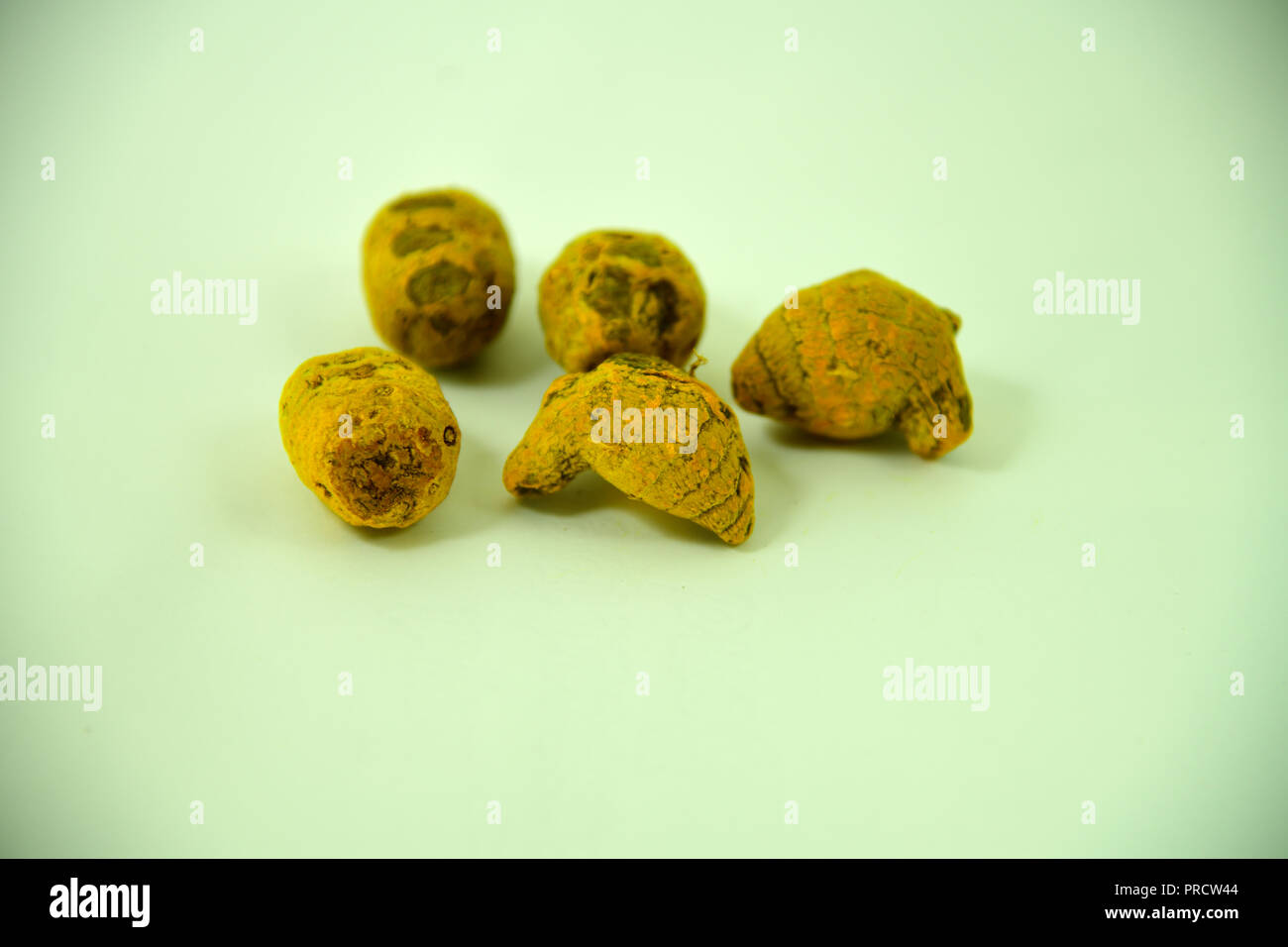 Dry Turmeric roots or barks isolated on white background Stock Photo ...