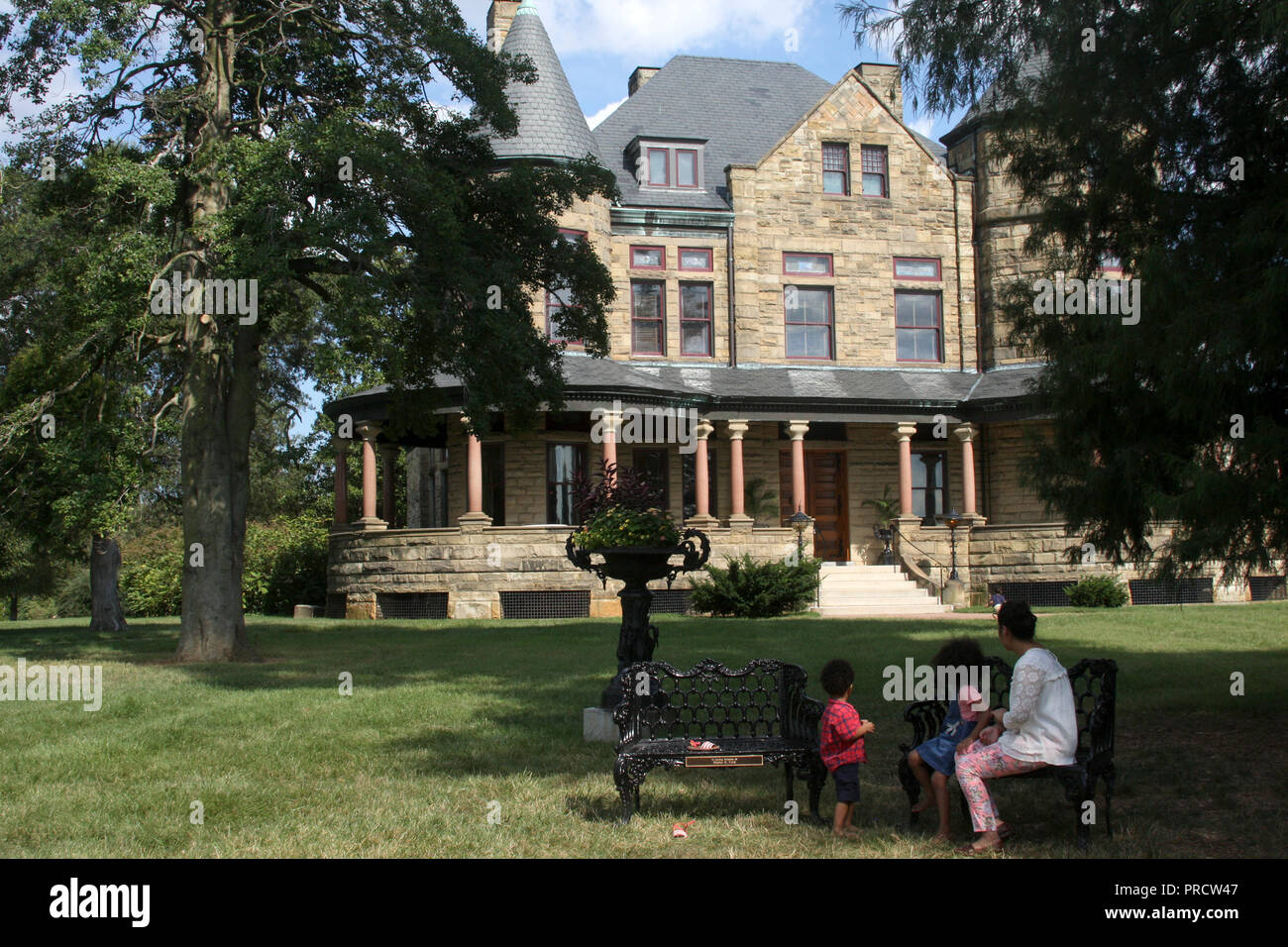 Family in front of historic Maymont Mansion in Richmond, Virginia, USA ...