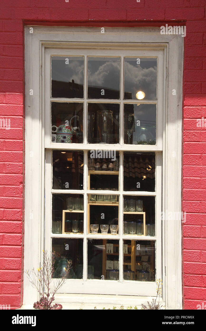 Store window seen from outside, with object seen through the glass ...
