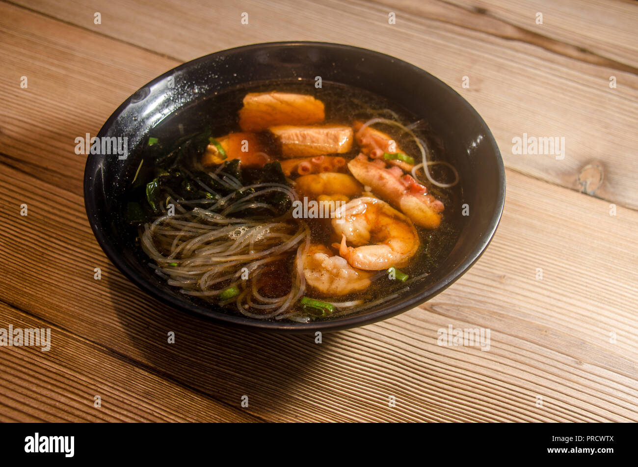 Oriental japanese seafood: nabeyaki with shrimp Stock Photo - Alamy