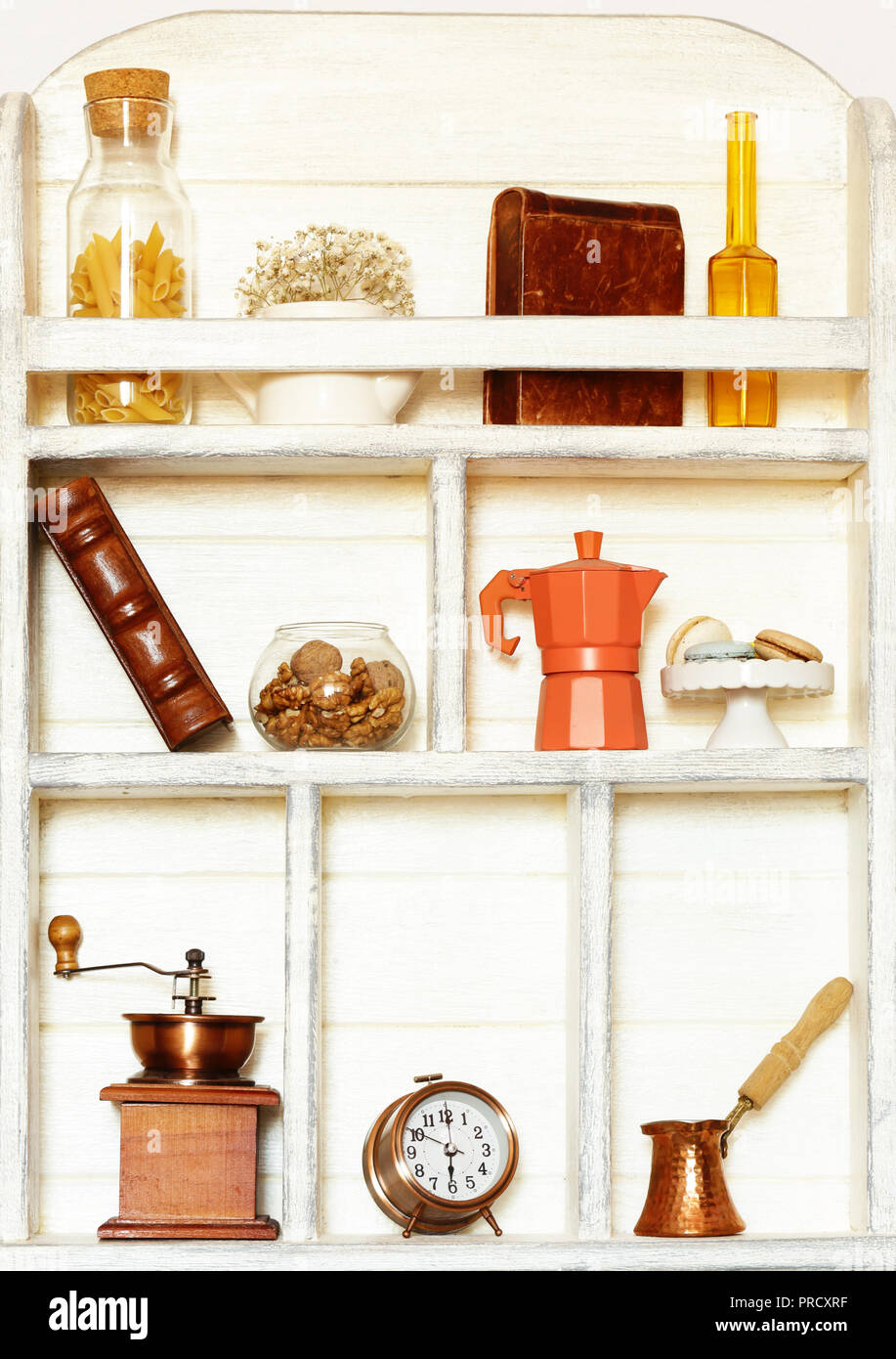 kitchen wooden white cupboard background with utensils and food Stock ...