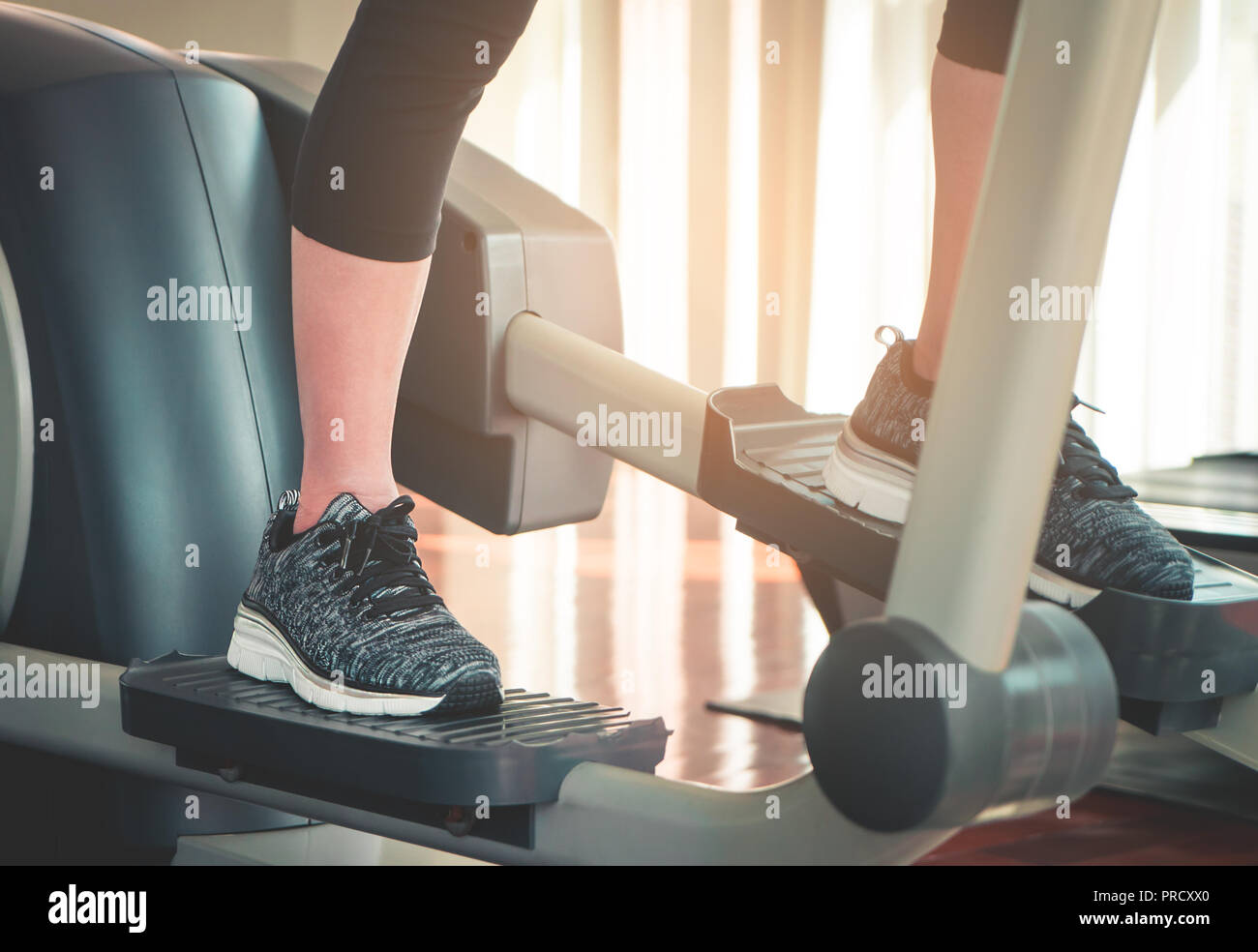 Foot working out on stepper exercise machine Stock Photo - Alamy