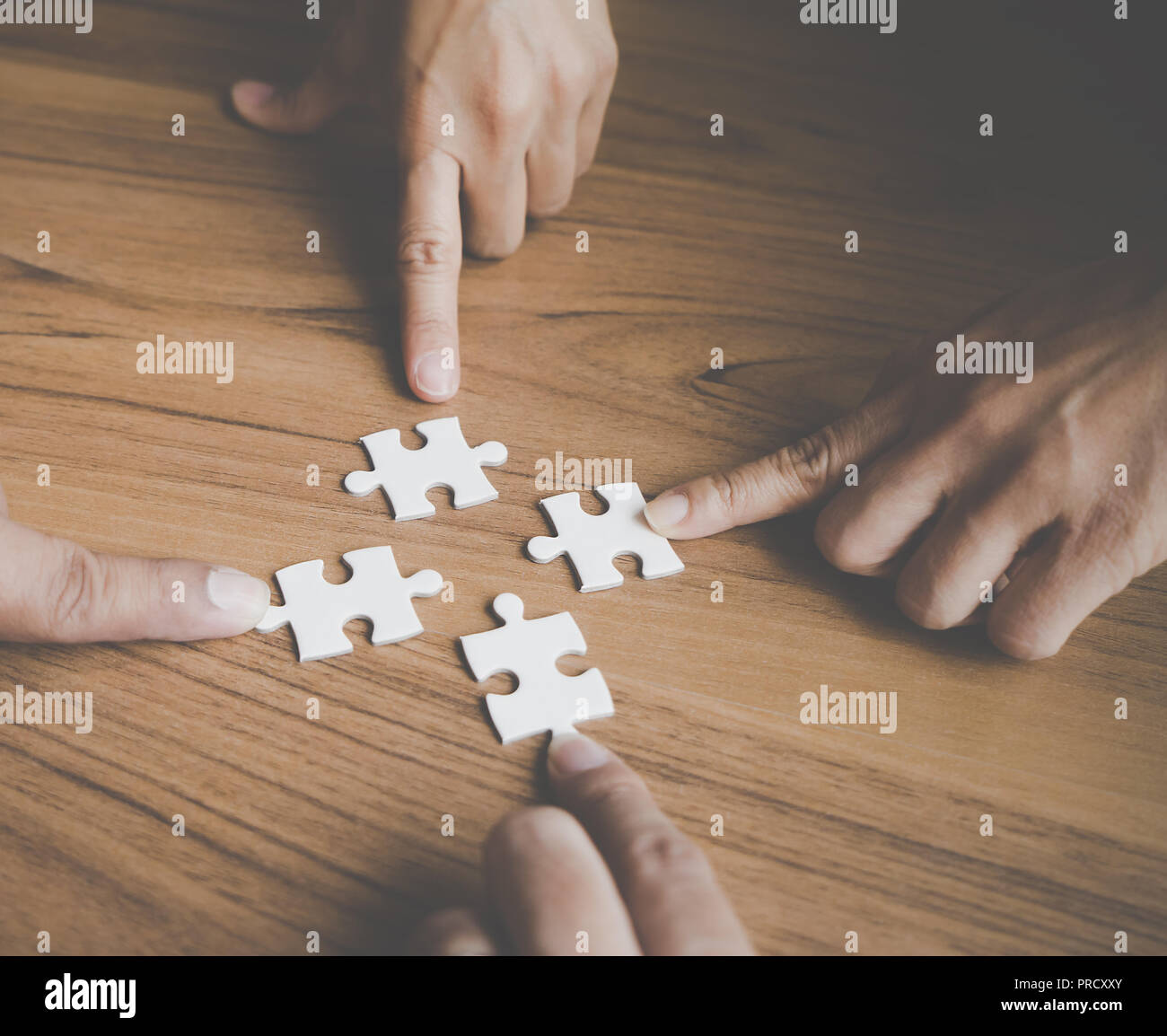 Four jigsaw puzzle pieces blue hi-res stock photography and images - Alamy