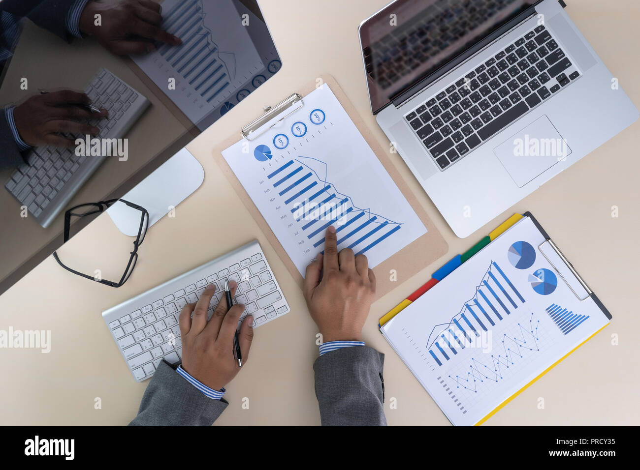 teamwork reports accounting concept analyzing financial Stock Photo - Alamy