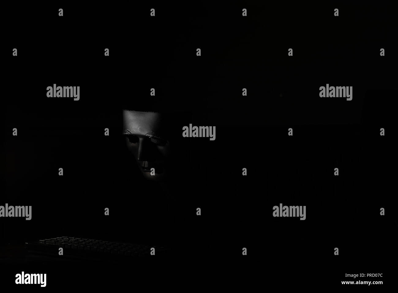 Black mask in the dark secretive ritual and mystery Stock Photo - Alamy