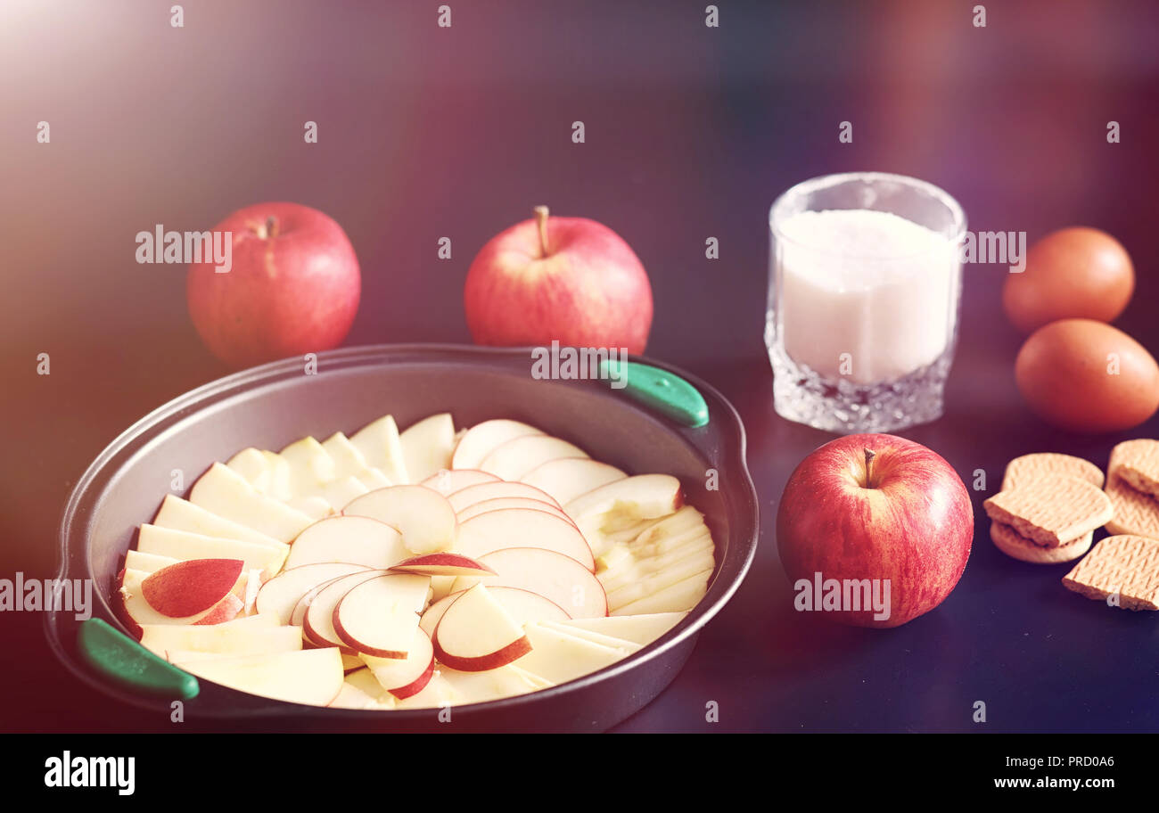 Preparation of apple pie at home. Homemade pastries with apples and ...