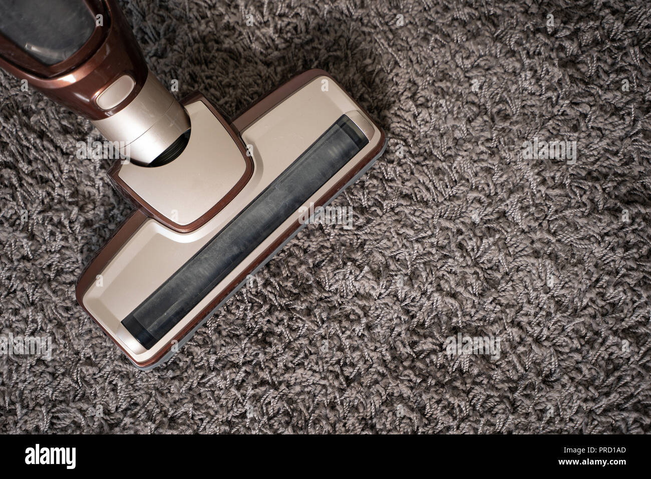 Professional hand using vacuum hi-res stock photography and images - Alamy