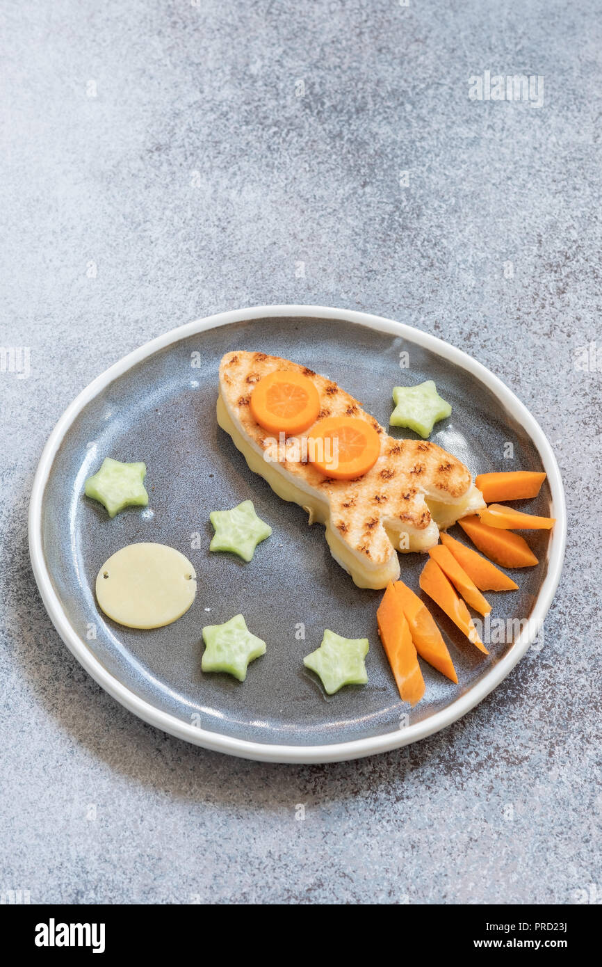Grilled cheese sandwich look like rocket in a space Stock Photo - Alamy