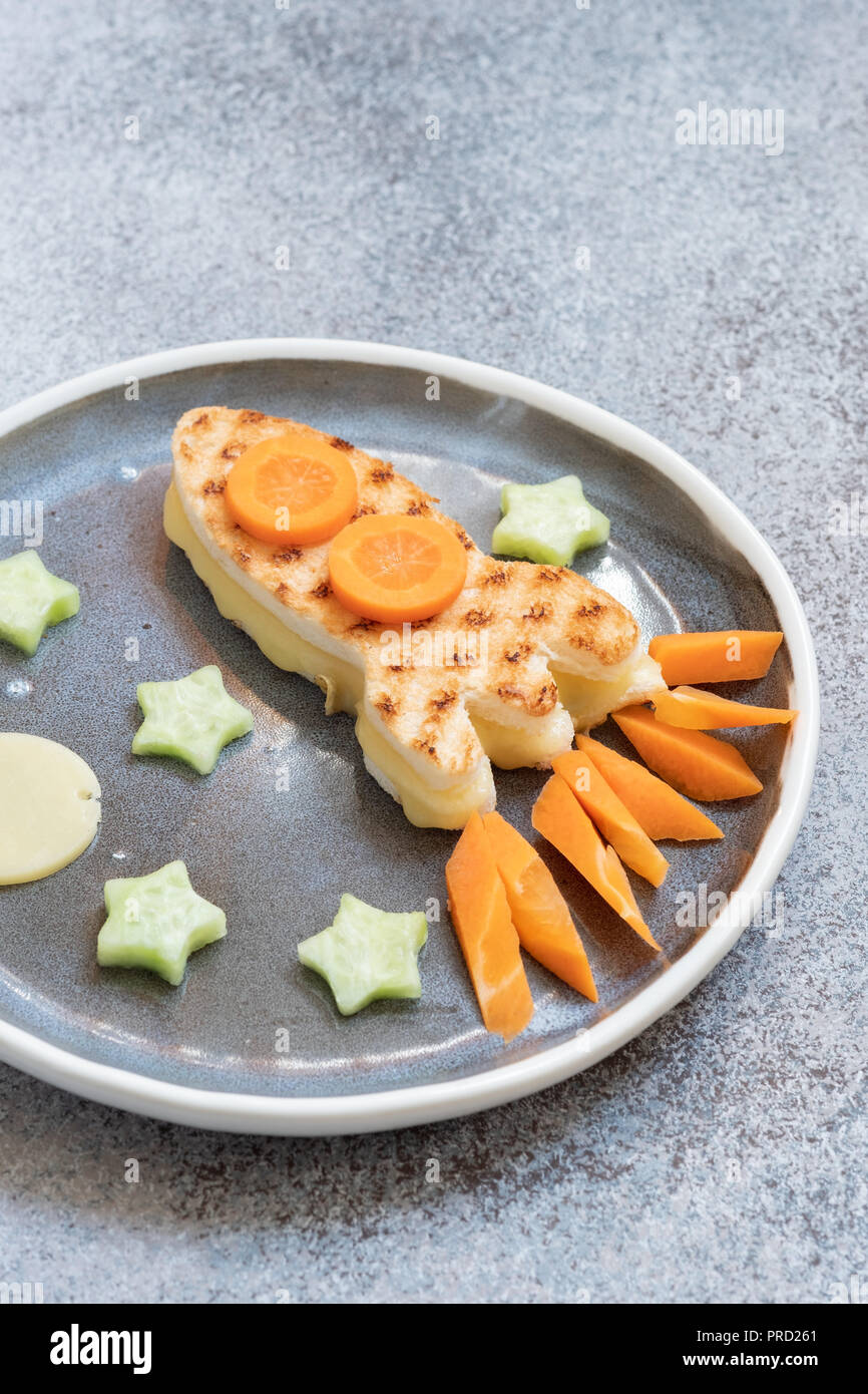 Grilled cheese sandwich look like rocket in a space Stock Photo - Alamy