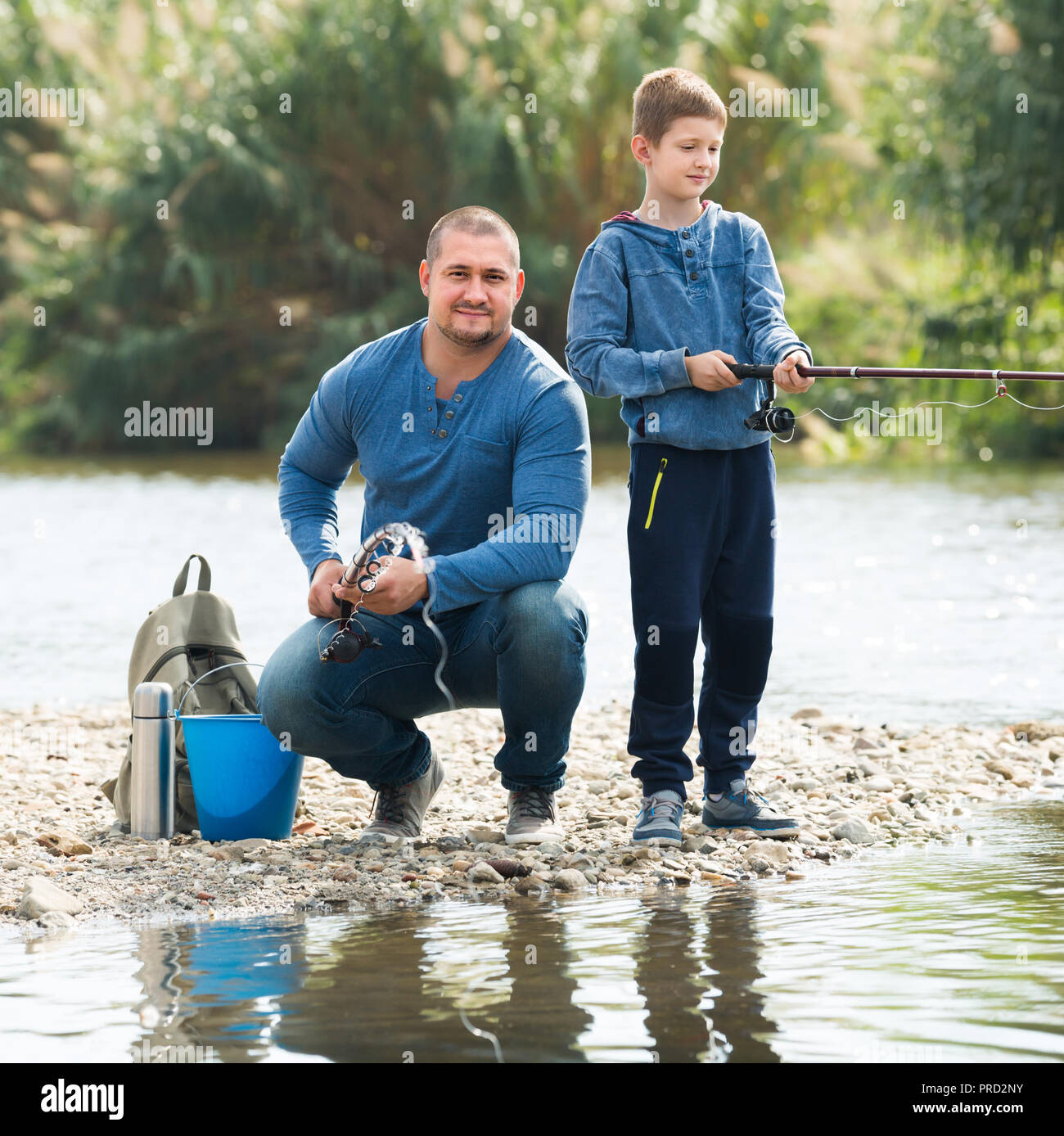 Glad father boy fishing hi-res stock photography and images - Alamy
