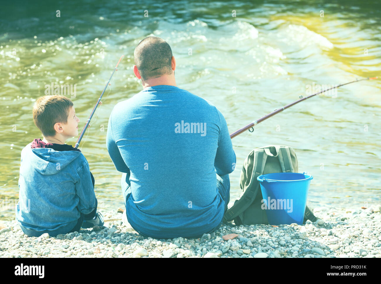 Father son fishing in pond hi-res stock photography and images - Alamy