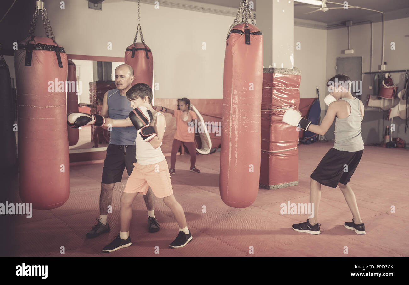 Boxing training in a teenage group in the gym Stock Photo - Alamy