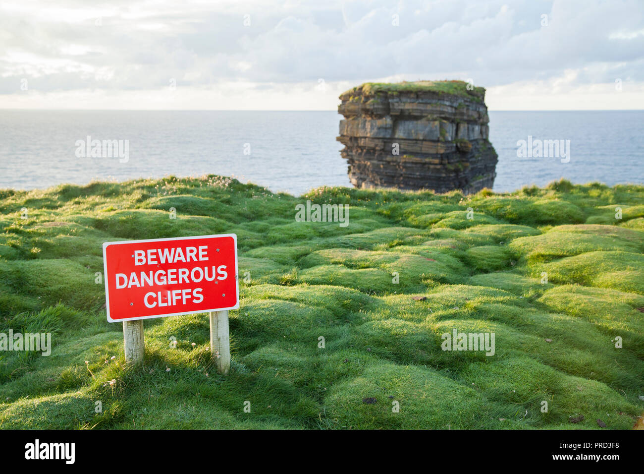 The danger sign at Downpatrick Head in Co. Mayo Stock Photo - Alamy