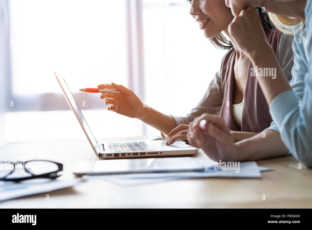 Two female colleagues in office working together Stock Photo - Alamy