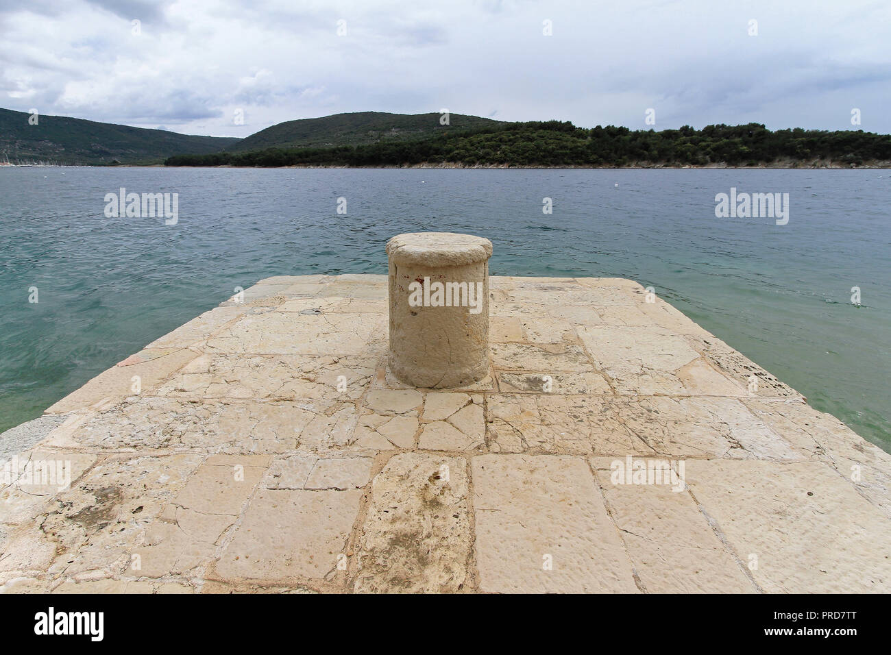 Mooring bollard post at pier for docking ships Stock Photo - Alamy