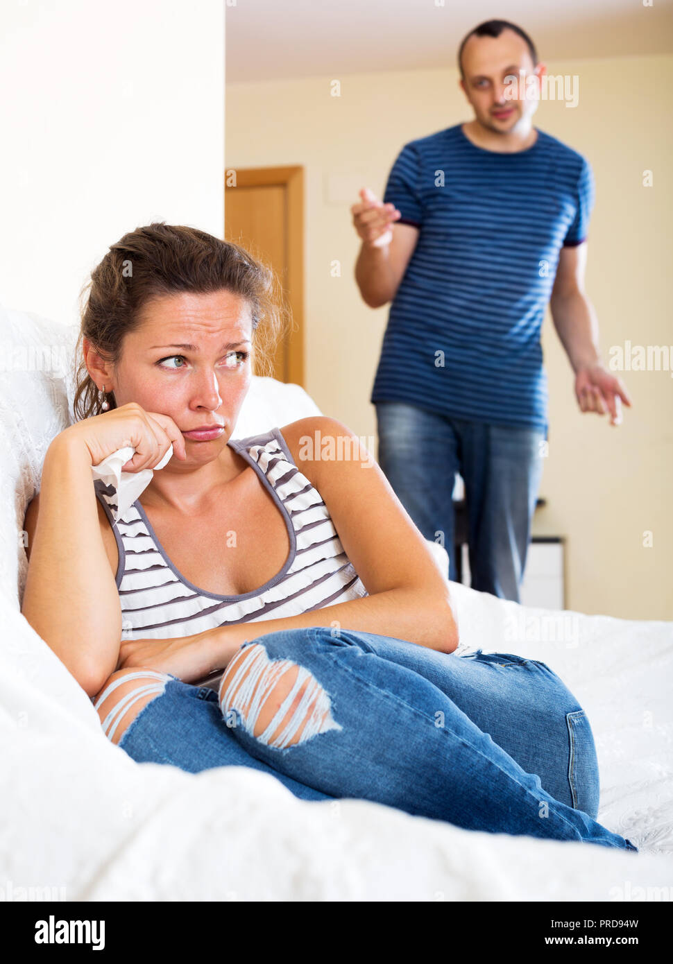 Woman sorting clothes out hi-res stock photography and images - Alamy