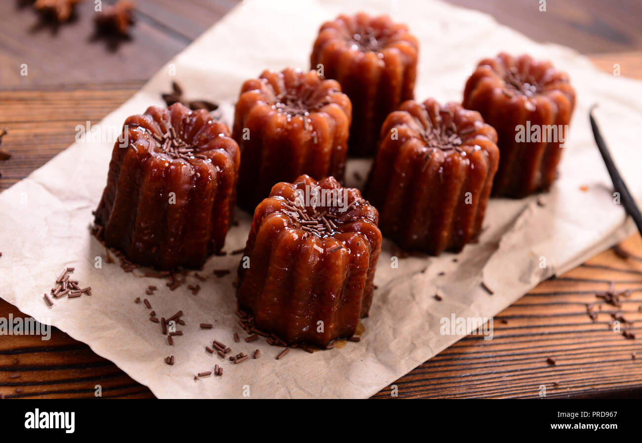 Caneles de bordeaux - traditional French sweet dessert Stock Photo - Alamy