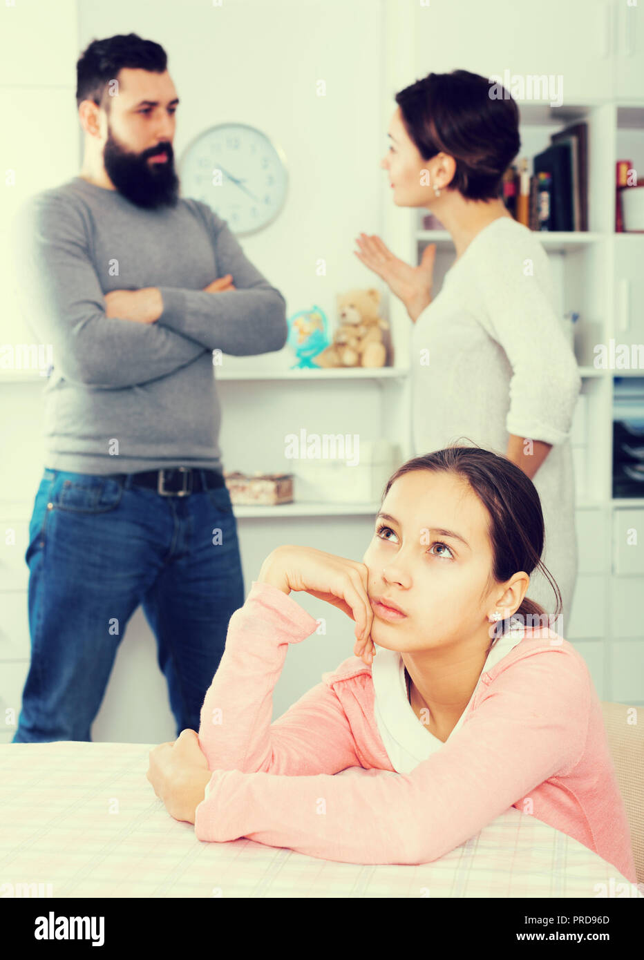 Parents Arguing With Teenager Listening High Resolution Stock ...