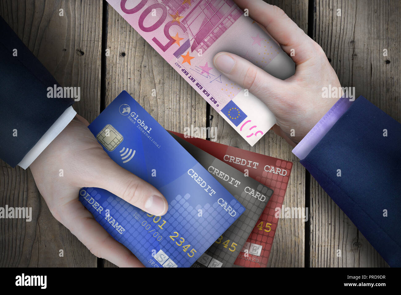 Two fiat currency bills being exchanged by two business people as part ...