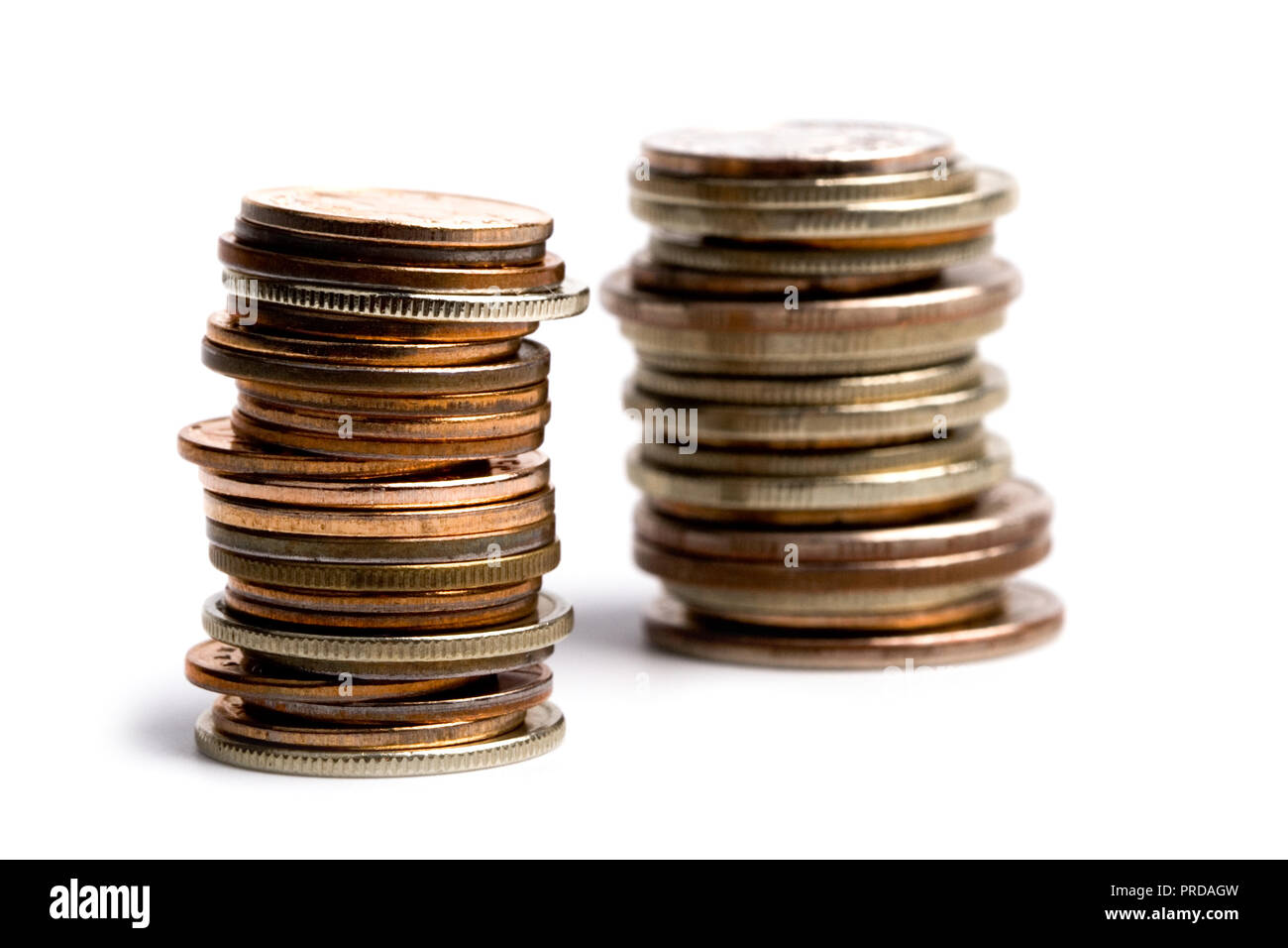 two coins stacks isolated on white background Stock Photo - Alamy