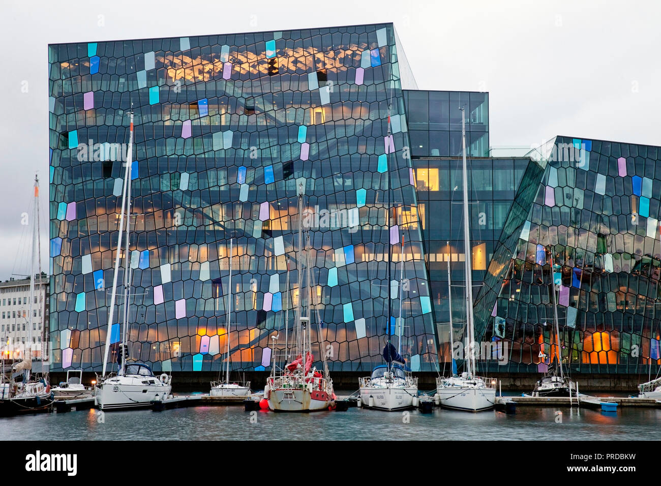 Harpa Concert Hall with marina, dichromatic glass facade with colour ...