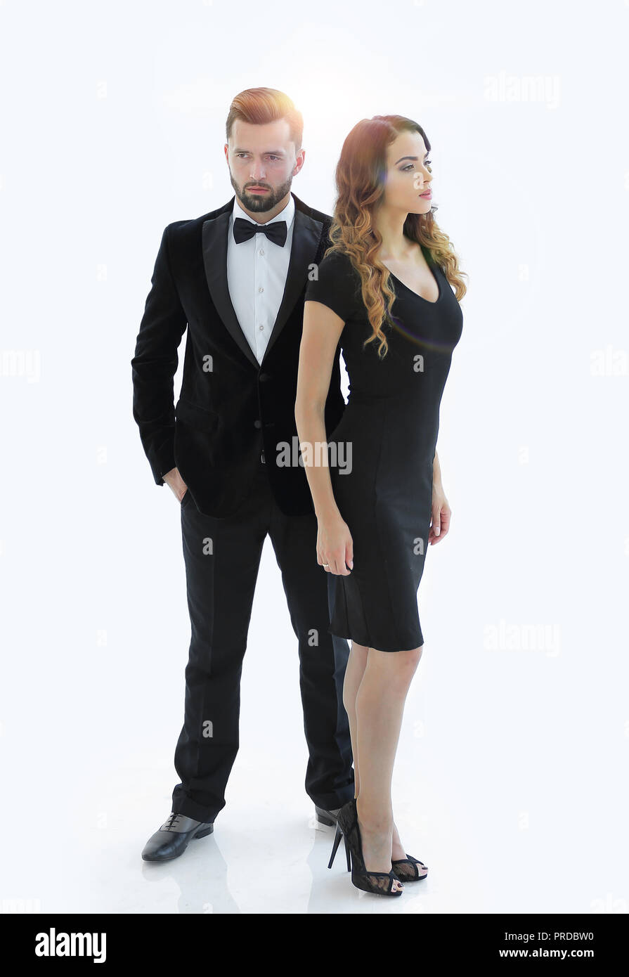pair of men and women posing for the camera in a studio Stock Photo - Alamy