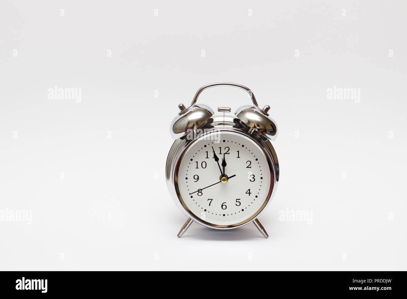 alarm clock on white background Stock Photo - Alamy