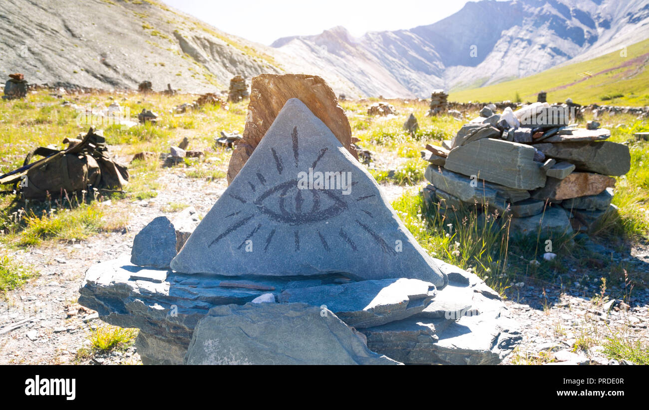 Stone symbol of worship of the gods, paganism Stock Photo - Alamy