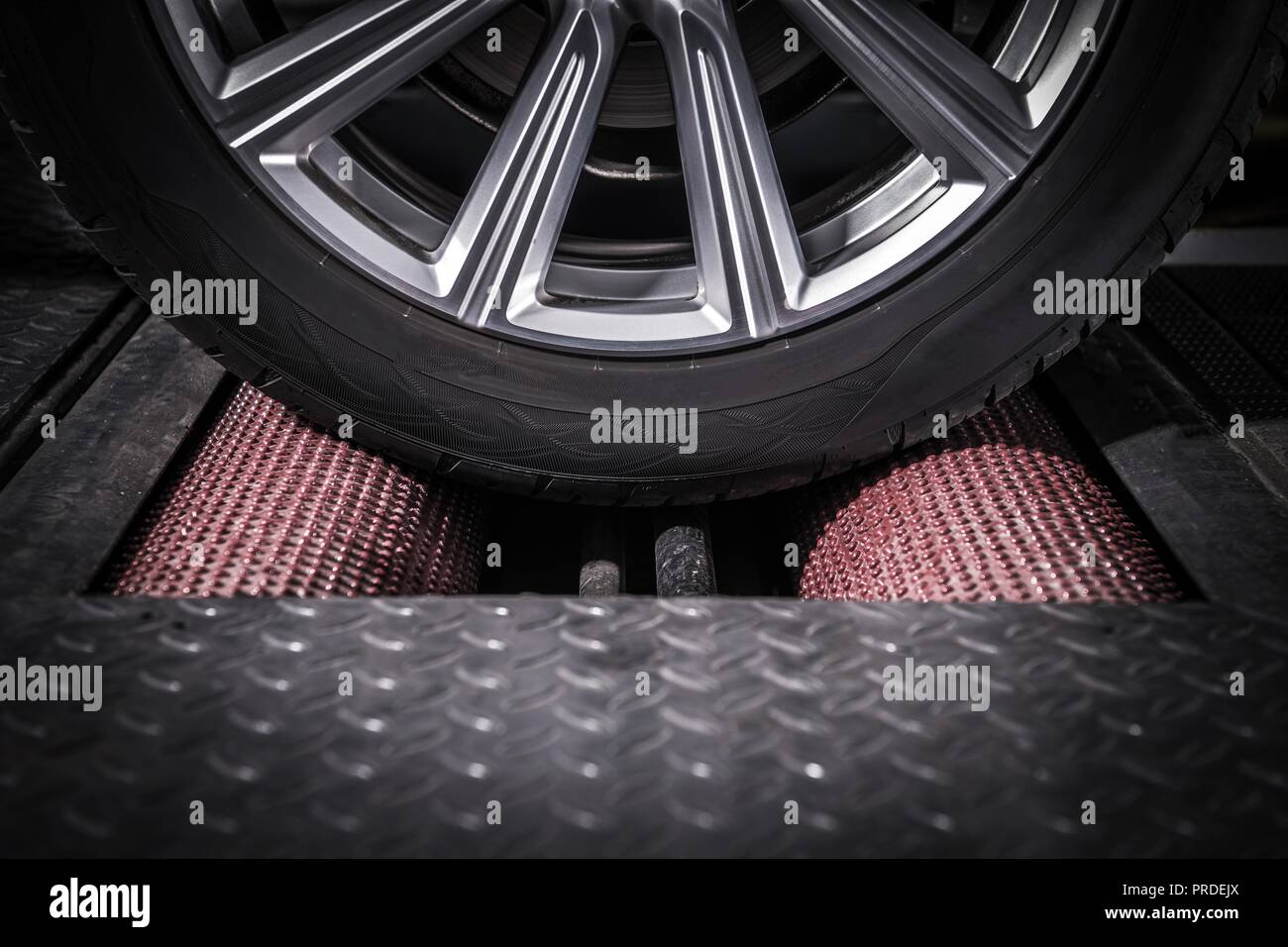 Roller Brake Tester in Action. Testing Vehicle Braking System. Car ...