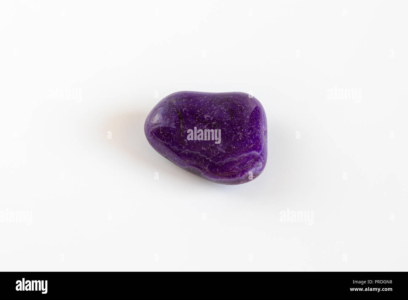 Natural mineral stone, purple gemstone isolated on white Stock Photo ...