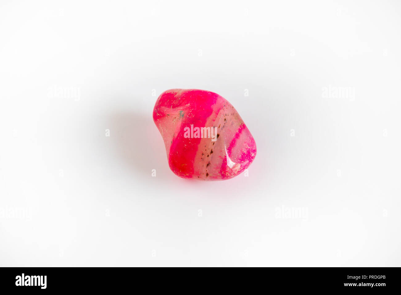 Natural mineral stone, pink gemstone isolated on white Stock Photo - Alamy