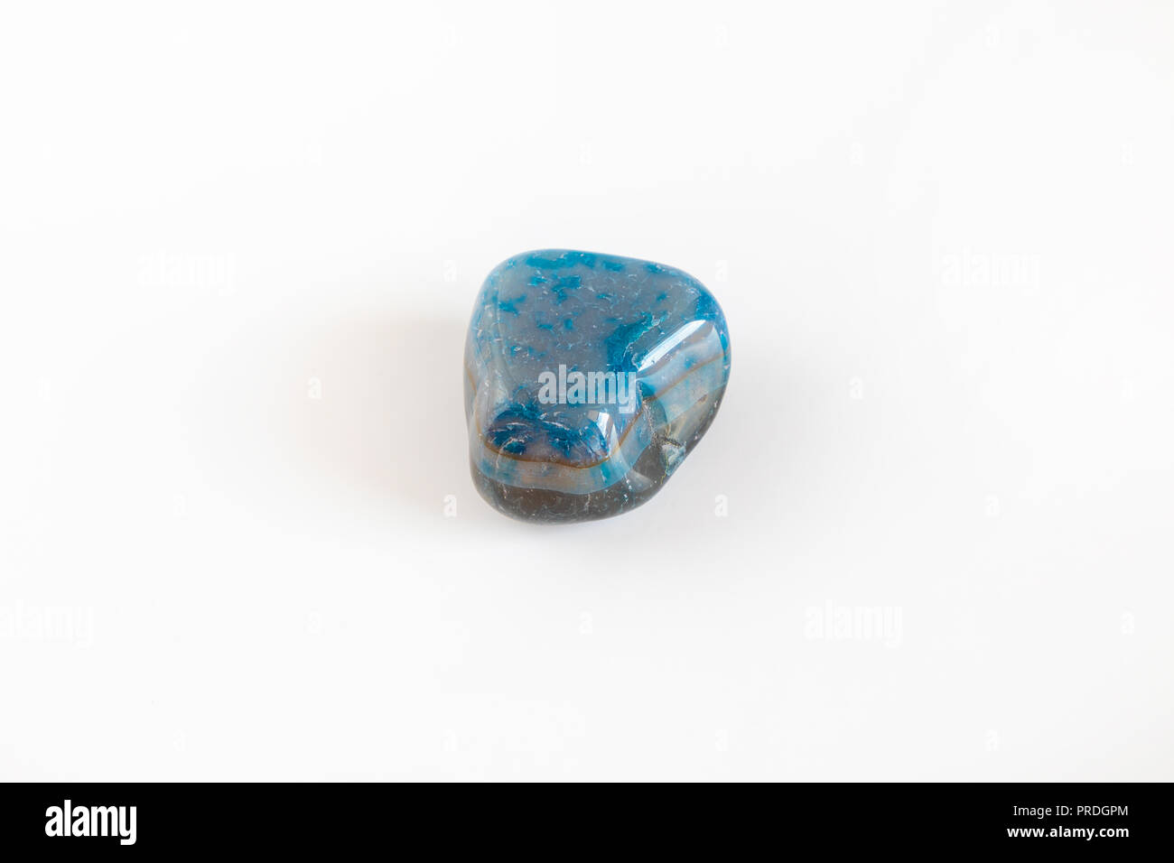 Natural mineral stone, blue gemstone isolated on white Stock Photo - Alamy