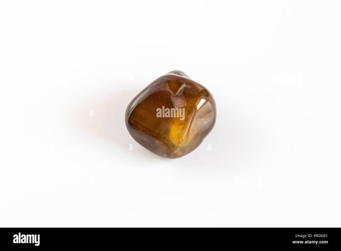 Natural mineral stone, brown gemstone isolated on white Stock Photo - Alamy