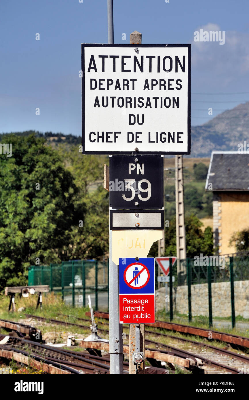 Railway sign on the line of the little yellow train that crosses the ...