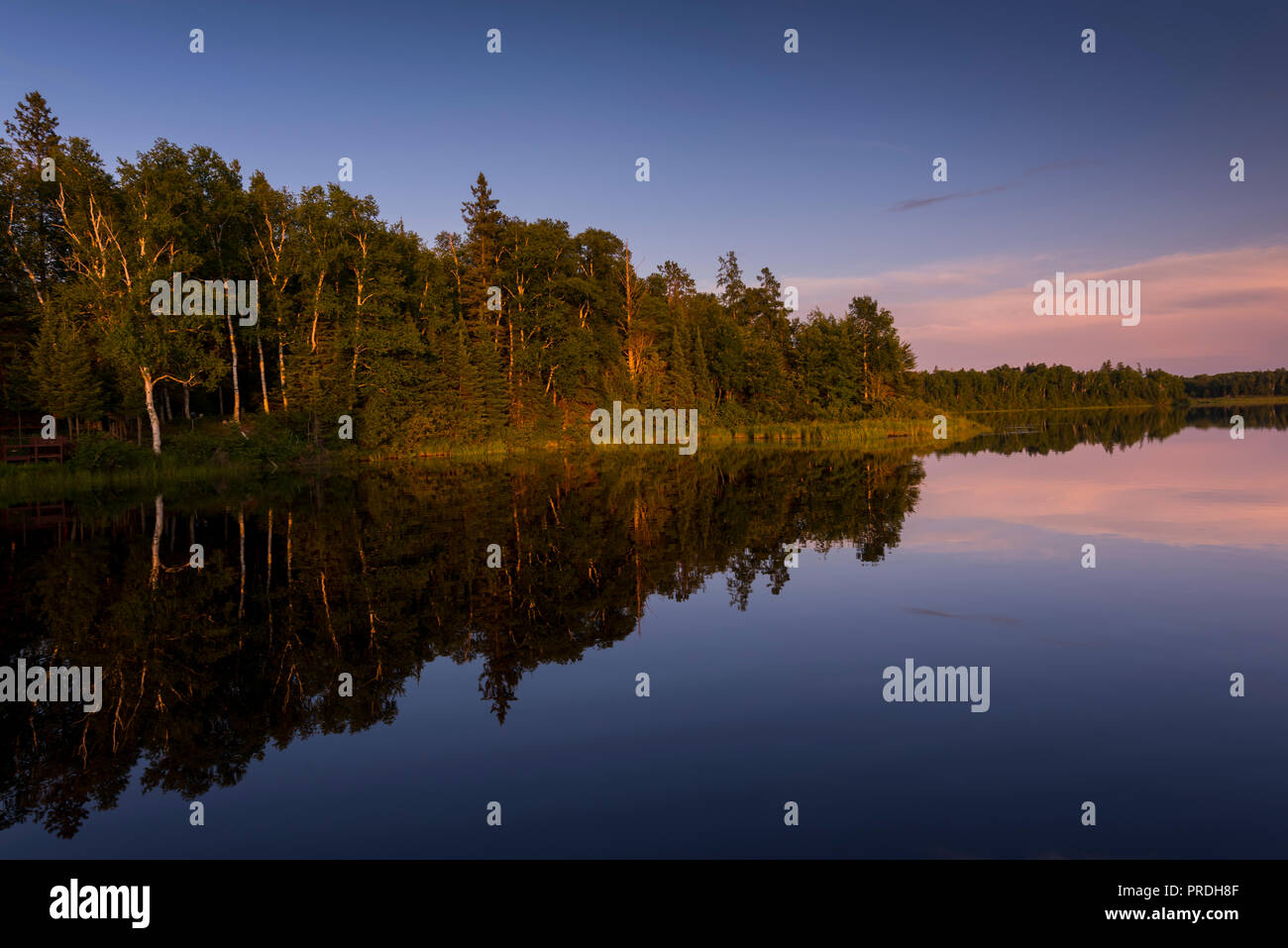 Post sunset glow on Spider Lake in Northern Wisconsin Stock Photo - Alamy