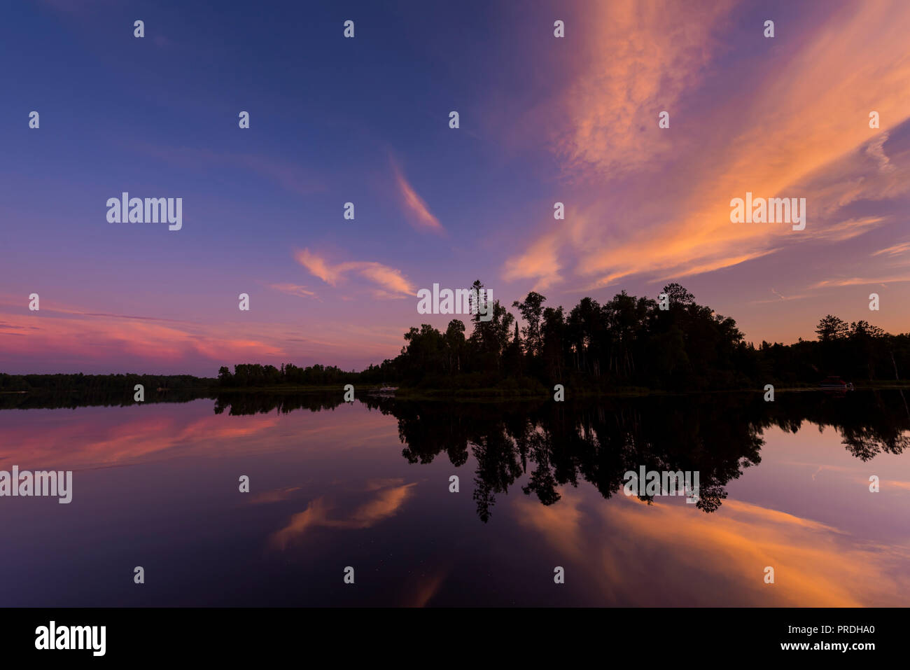 Post sunset glow on Spider Lake in Northern Wisconsin Stock Photo - Alamy