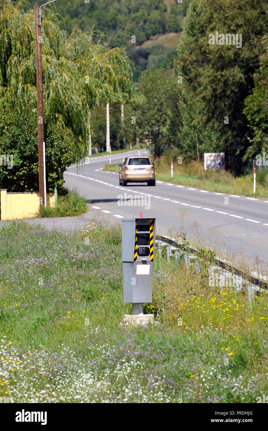 Road radar measuring the speed of vehicles and photographing those who ...