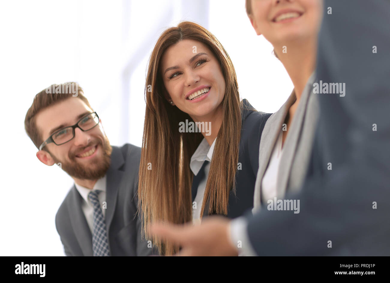 close up.successful employees listen to their boss Stock Photo - Alamy