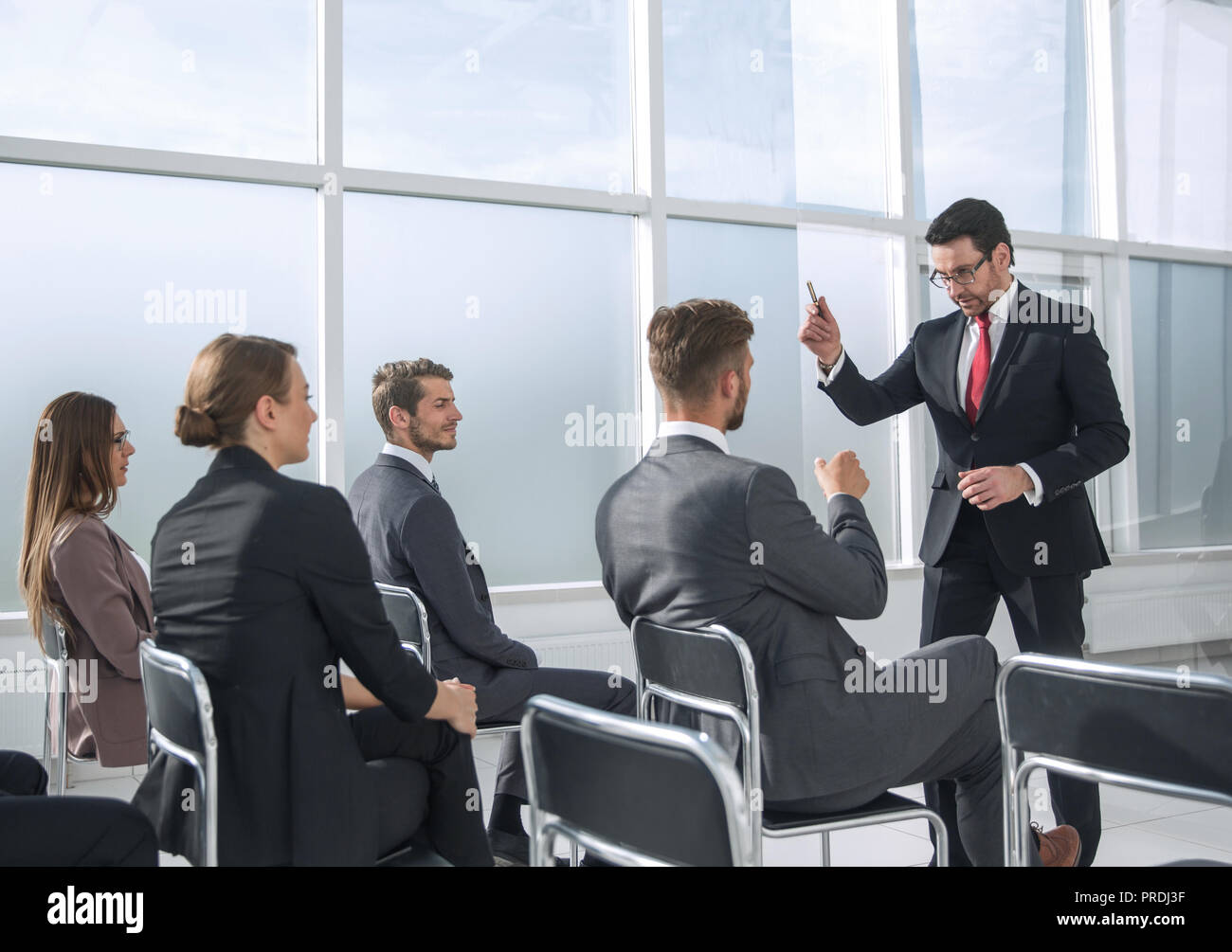 Picture showing business people having a conference Stock Photo - Alamy