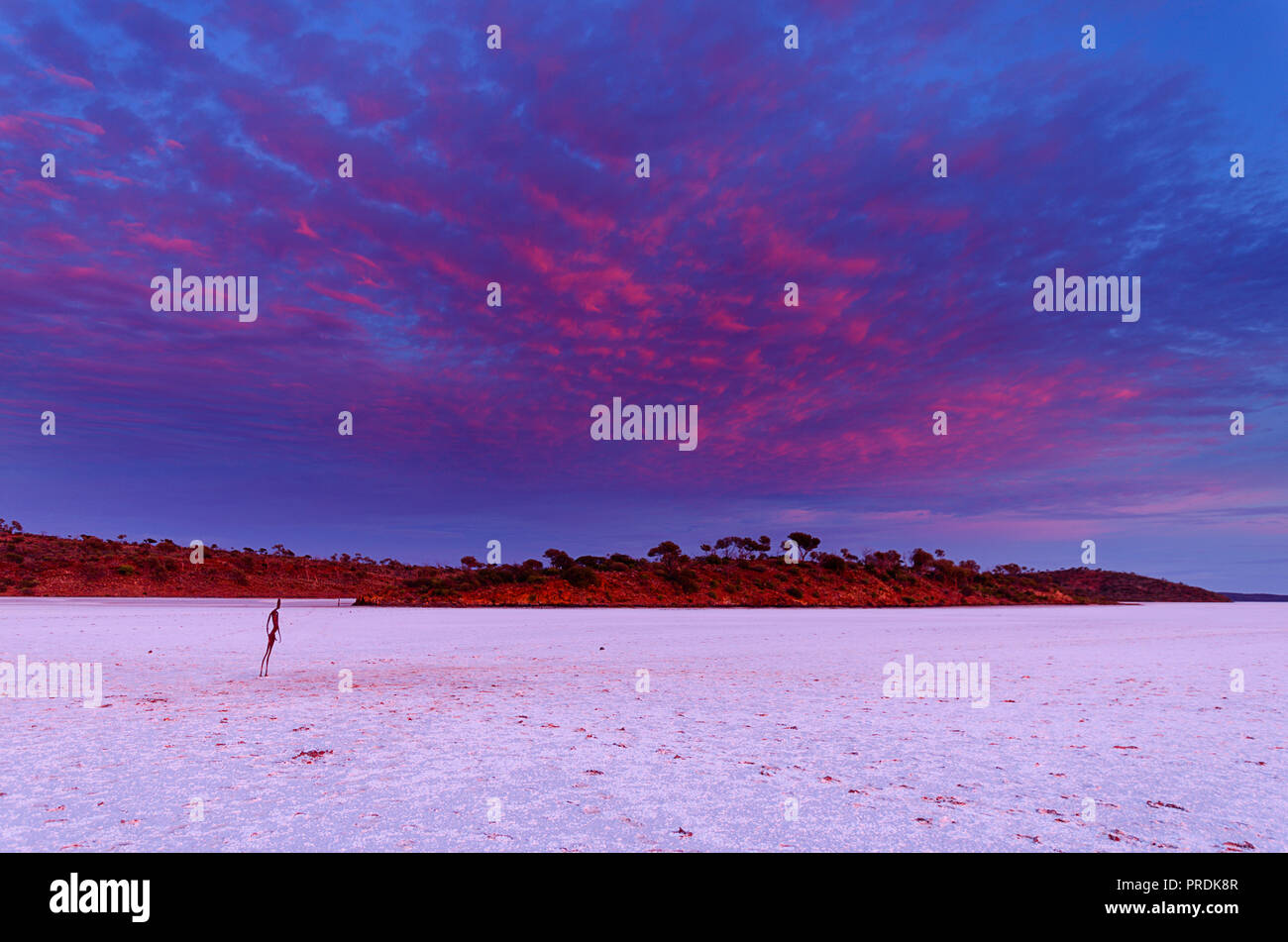 Steel figures by sculptor Antony Gormley at dawn dotted across Lake ...