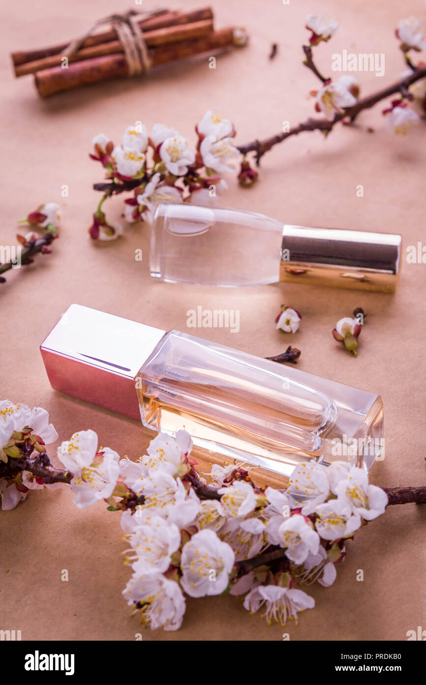 Bottles of perfume with ingredients on paper Stock Photo - Alamy