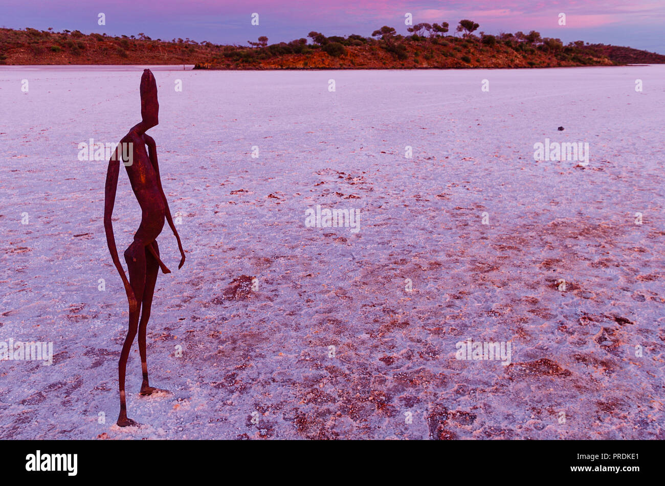 Steel figures by sculptor Antony Gormley at dawn dotted across Lake ...