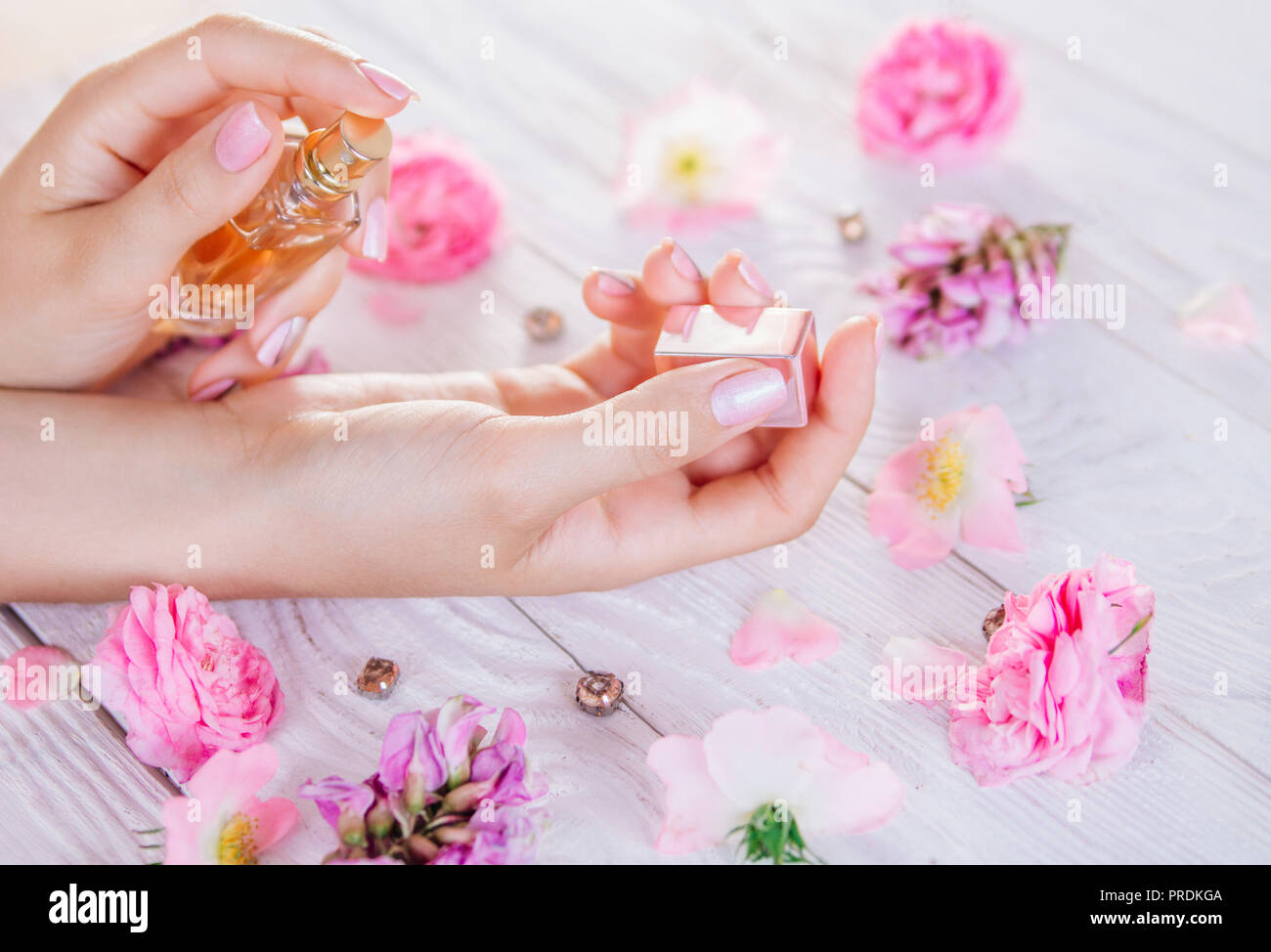 Woman wrist perfume hi-res stock photography and images - Alamy