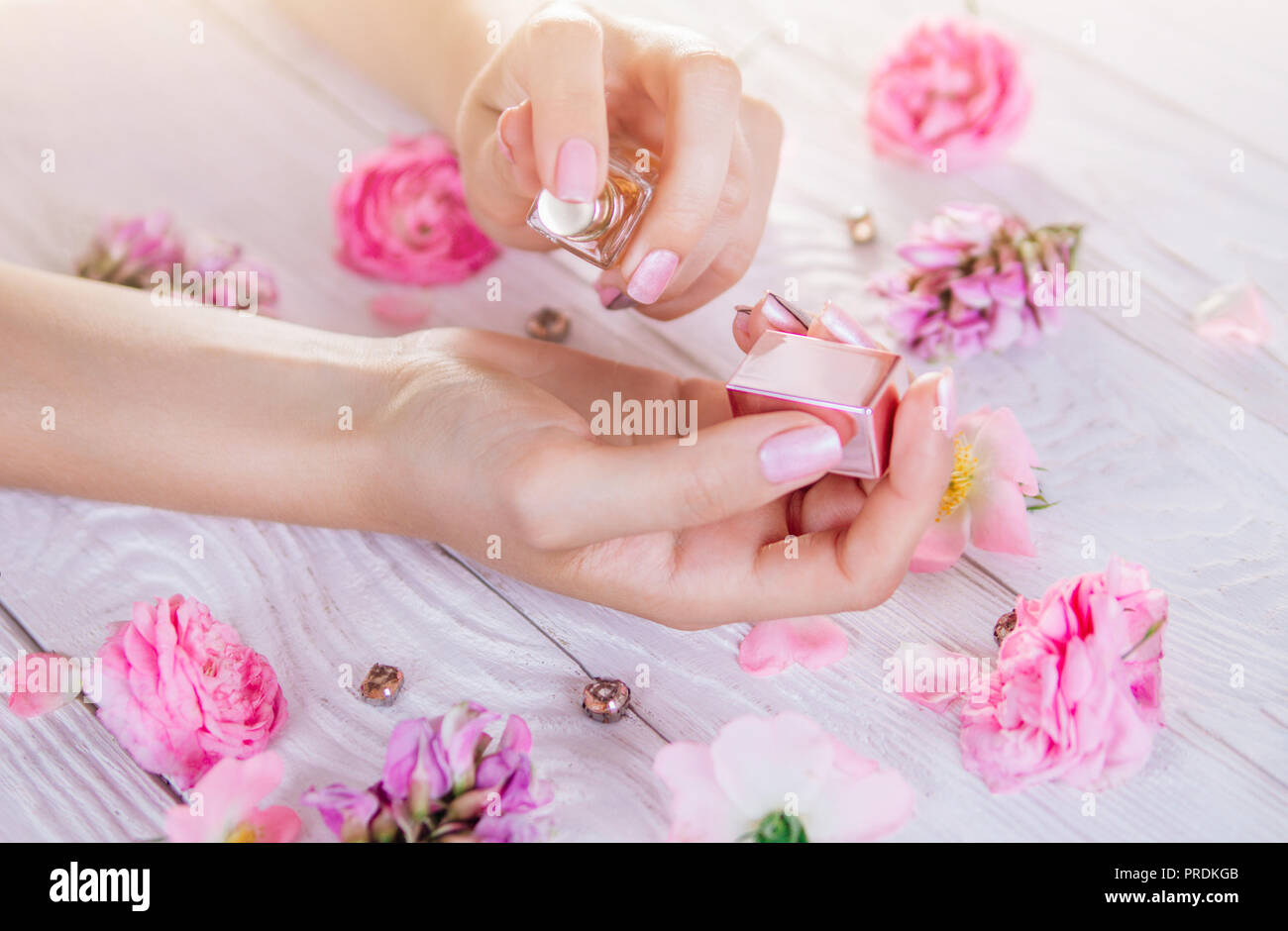 Woman wrist perfume hi-res stock photography and images - Alamy