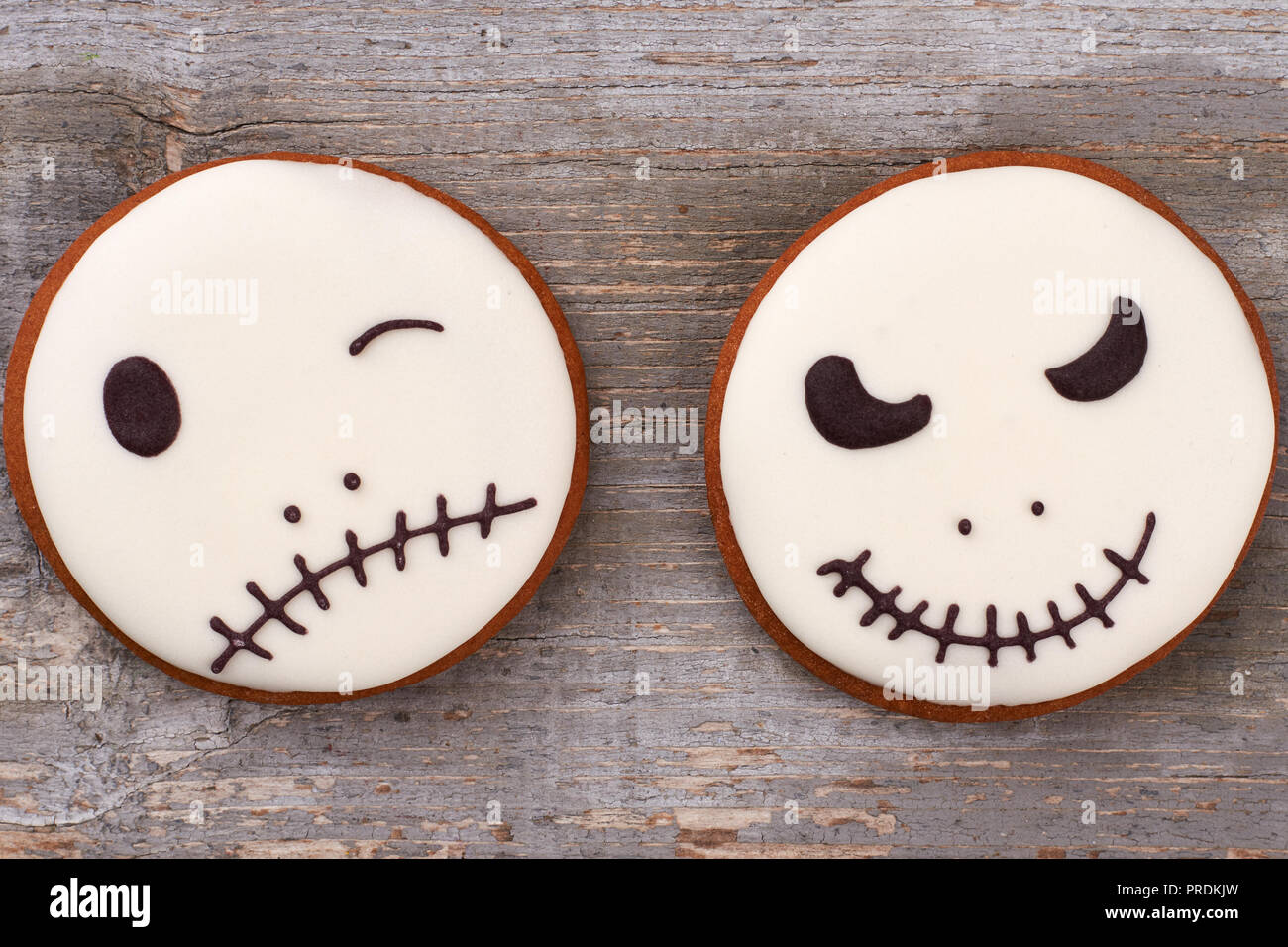 Halloween gingerbread cookies on wooden background Stock Photo - Alamy