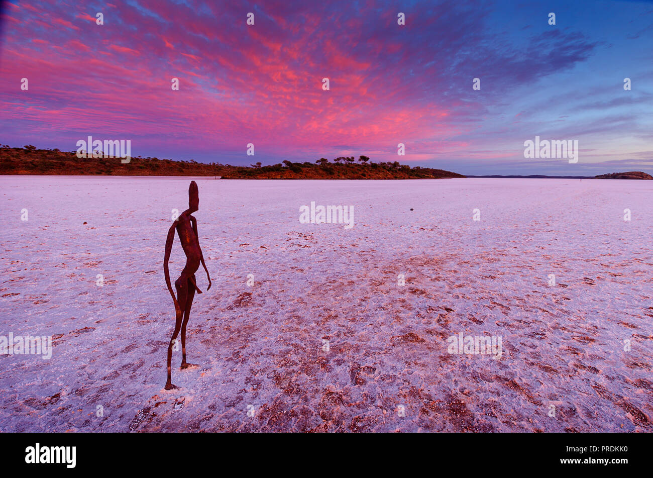 Steel figures by sculptor Antony Gormley at dawn dotted across Lake ...