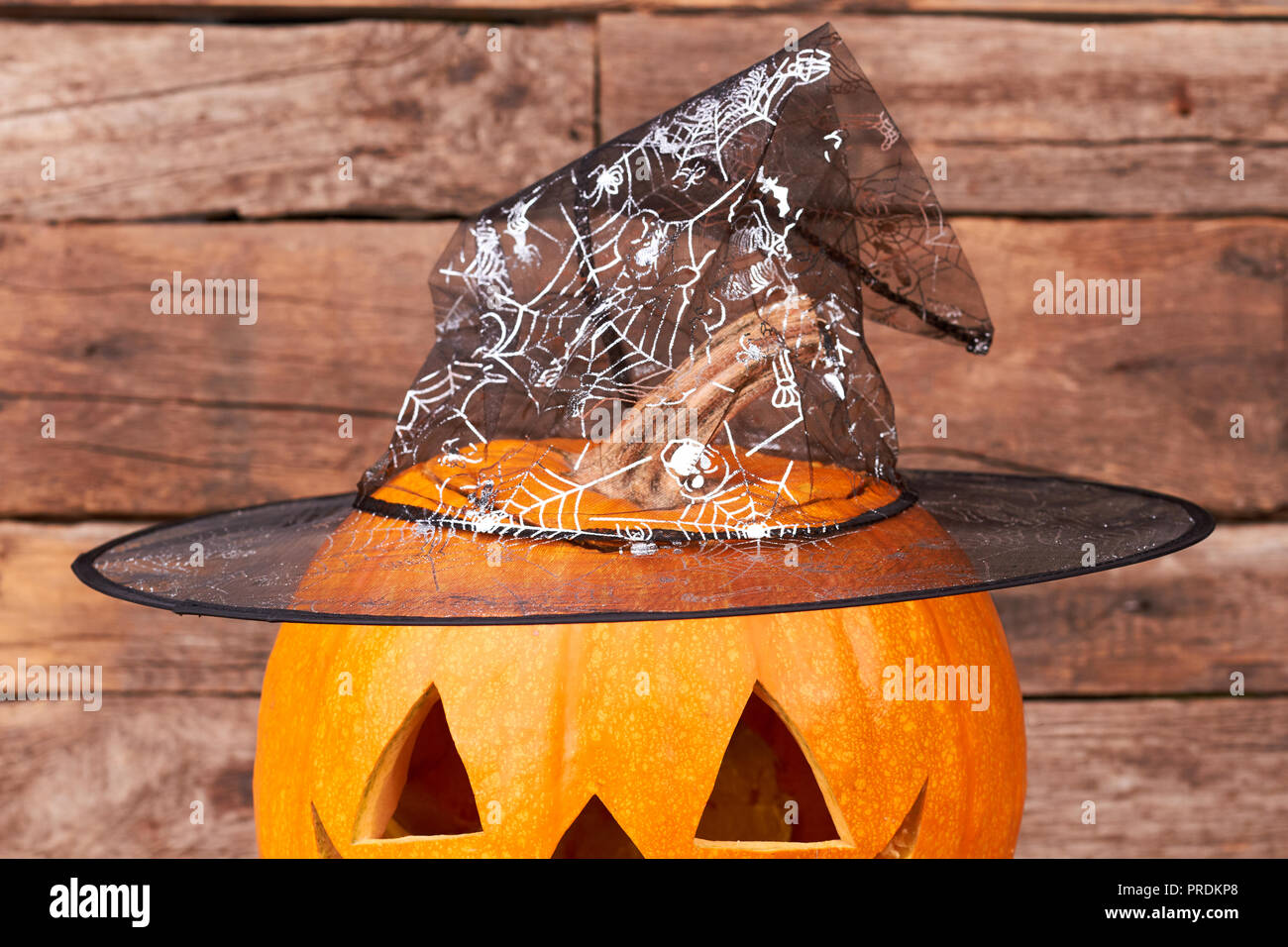 Carved Halloween pumpkin with wizards hat Stock Photo - Alamy