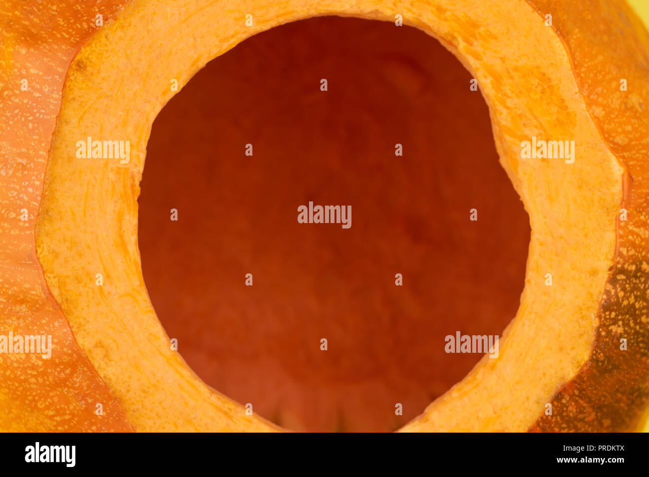 Hole in ripe pumpkin close up Stock Photo - Alamy