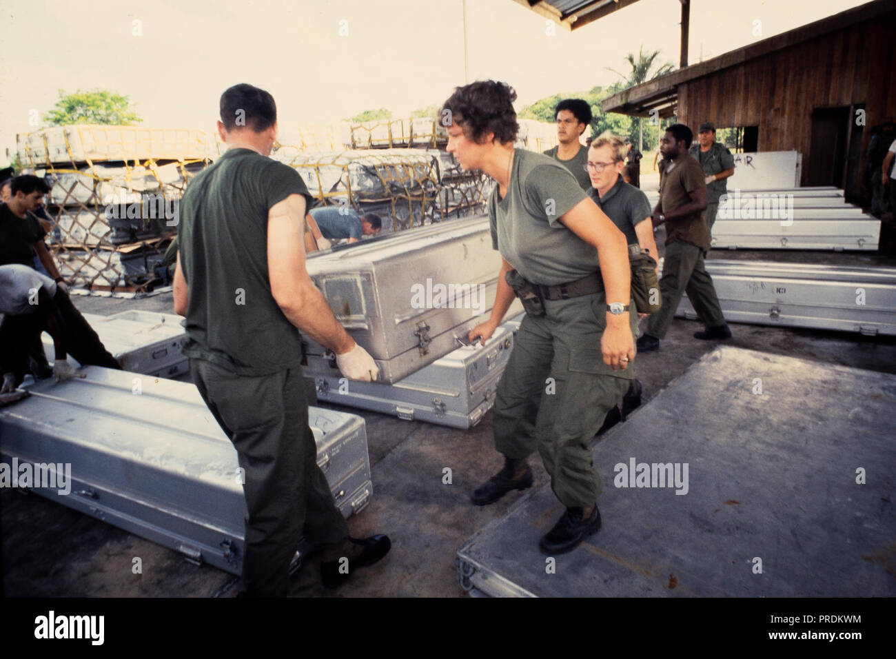 United States military personnel remove American bodies from the cult ...